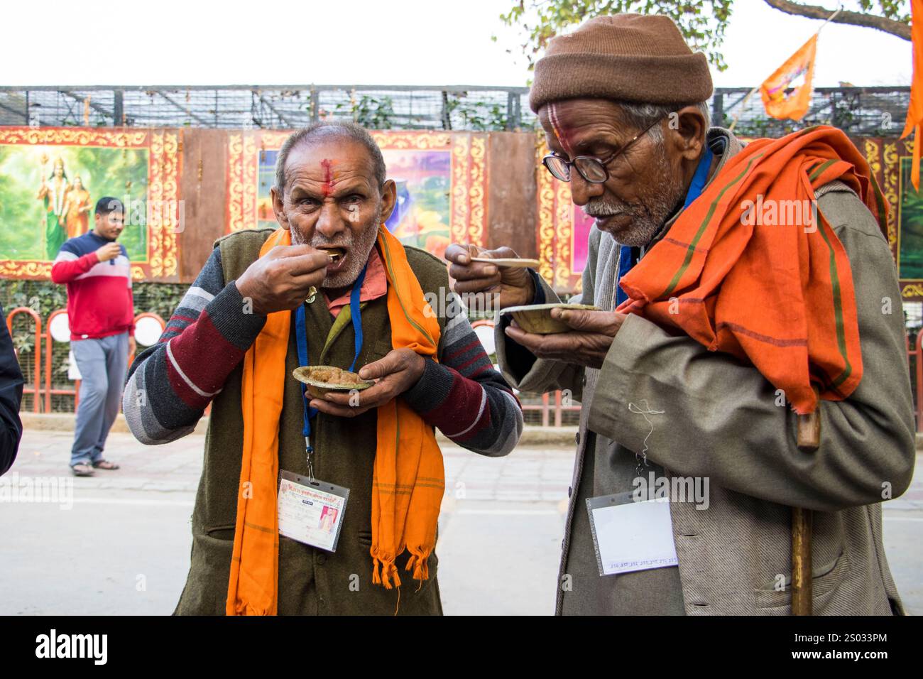 Varanasi temple associate distributes semolina halwa snacks each ...