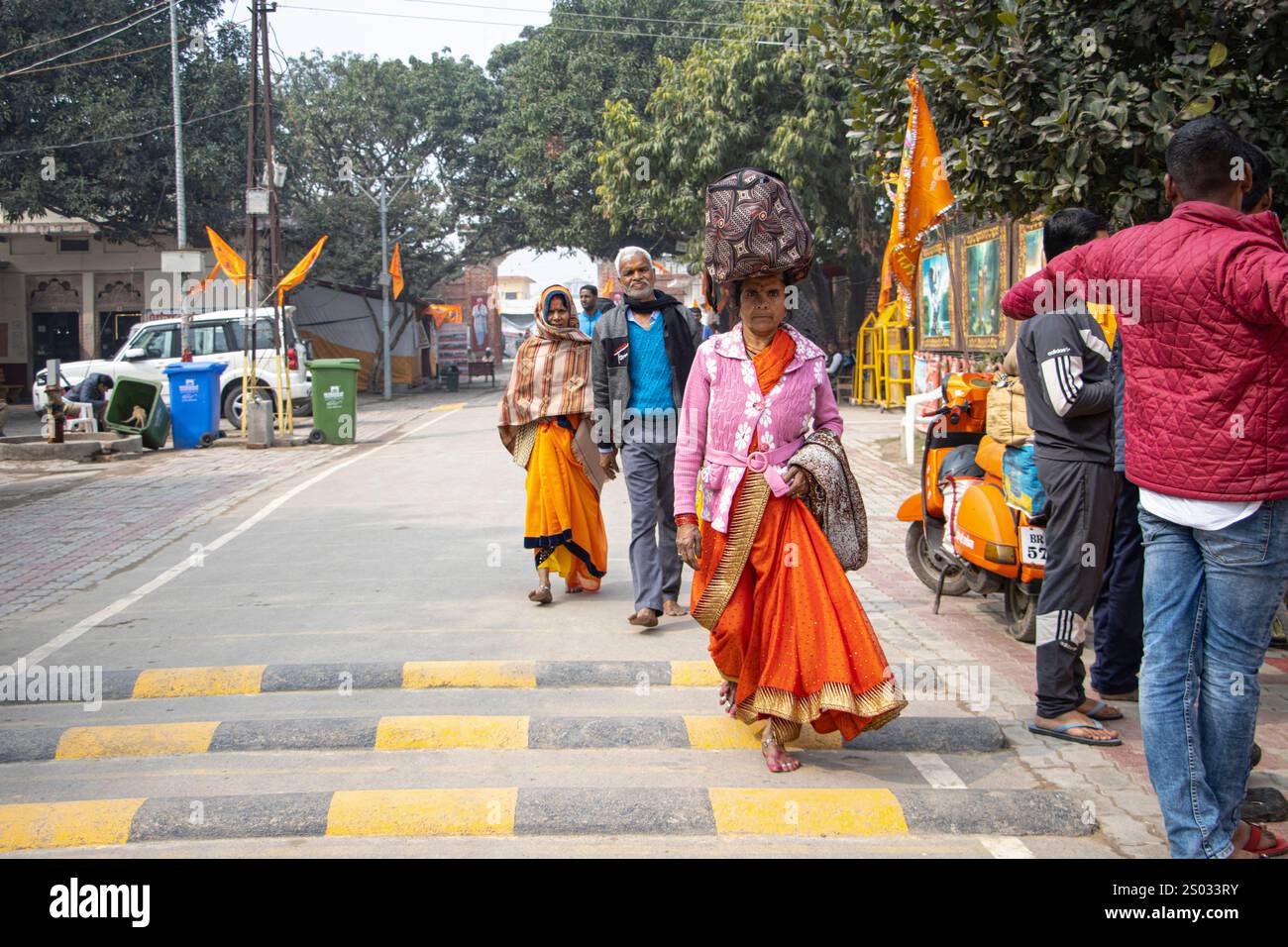 Pilgrims arriving with loads on their heads at Panchavati facility ...