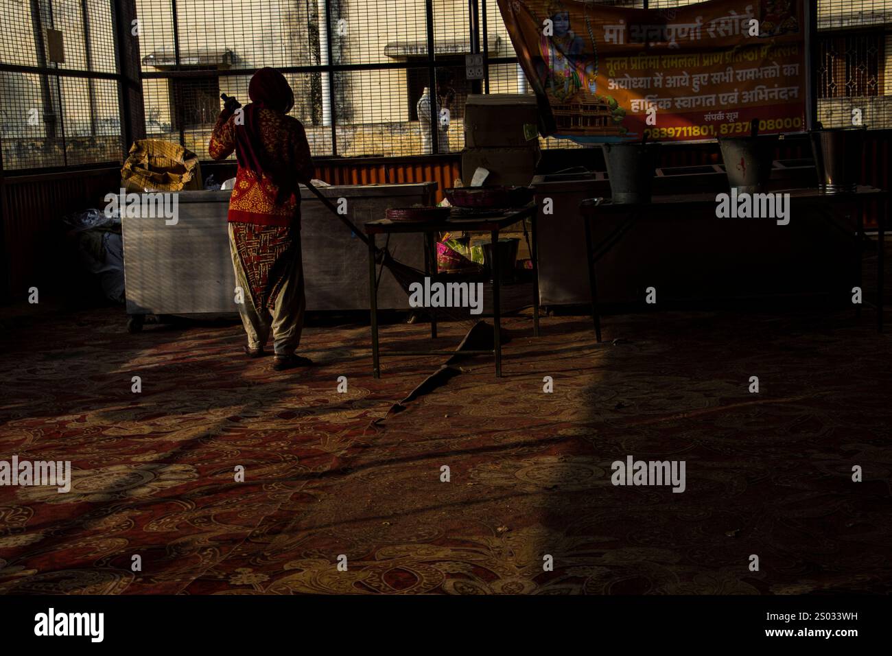 Sweeping dining floors of Panchavati facility, Karsevak Puram in ...