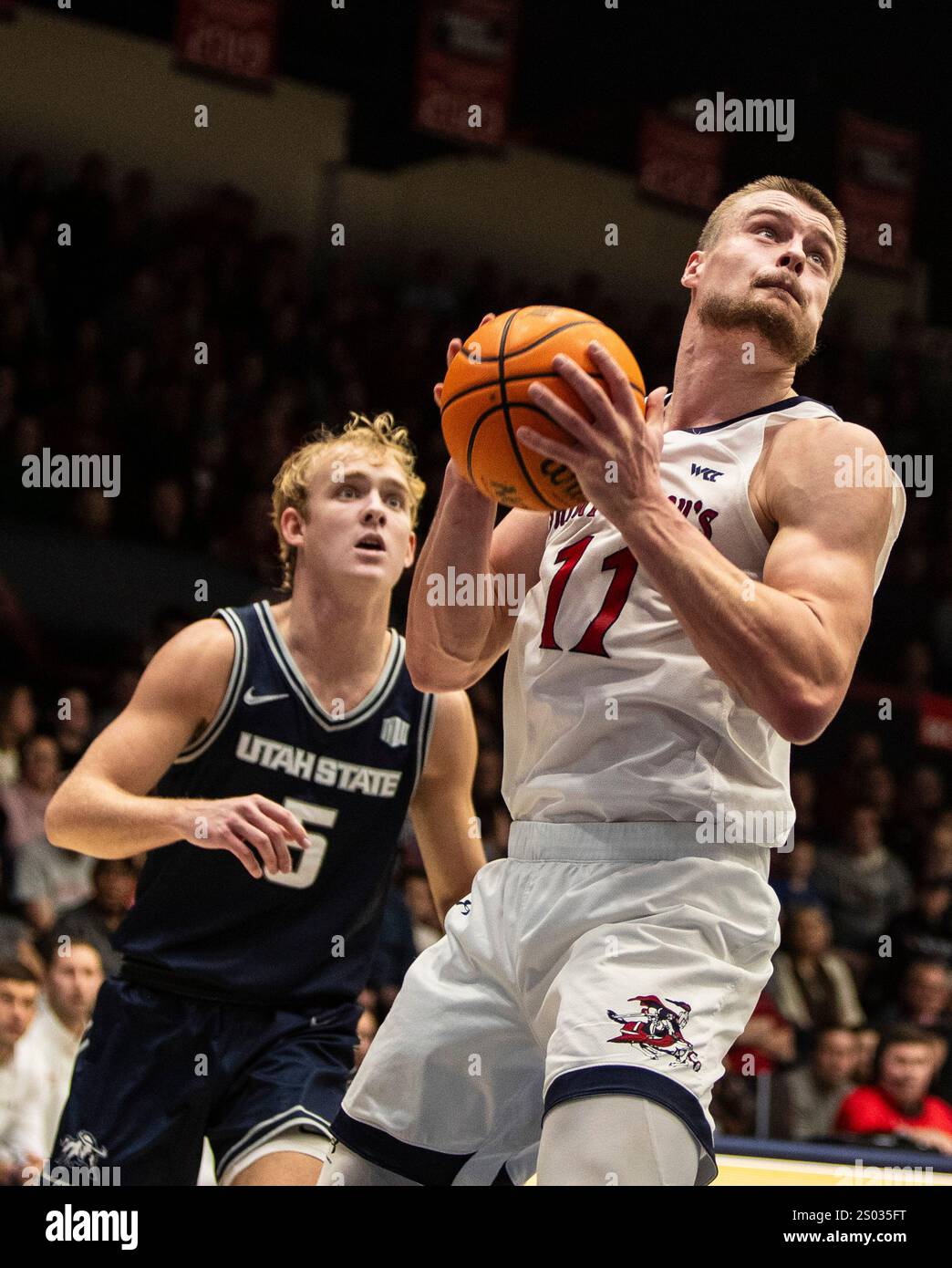 Moraga, CA U.S. 22nd Dec, 2024. A. Saint Marys center Mitchell Saxen ...