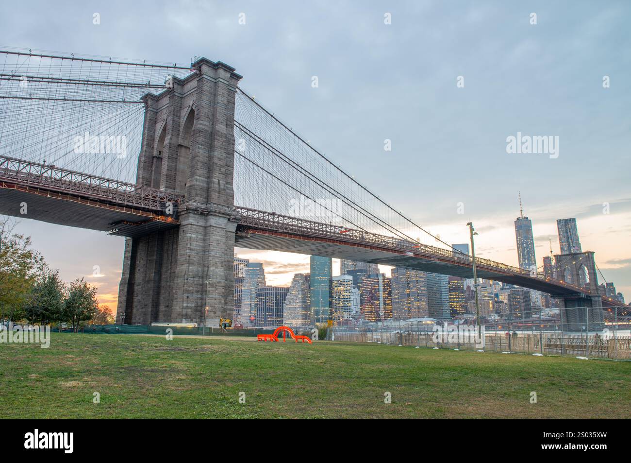 Sunset Over the Brooklyn Bridge, Capturing NYC’s Iconic Landmark in Golden Light Stock Photo - Alamy