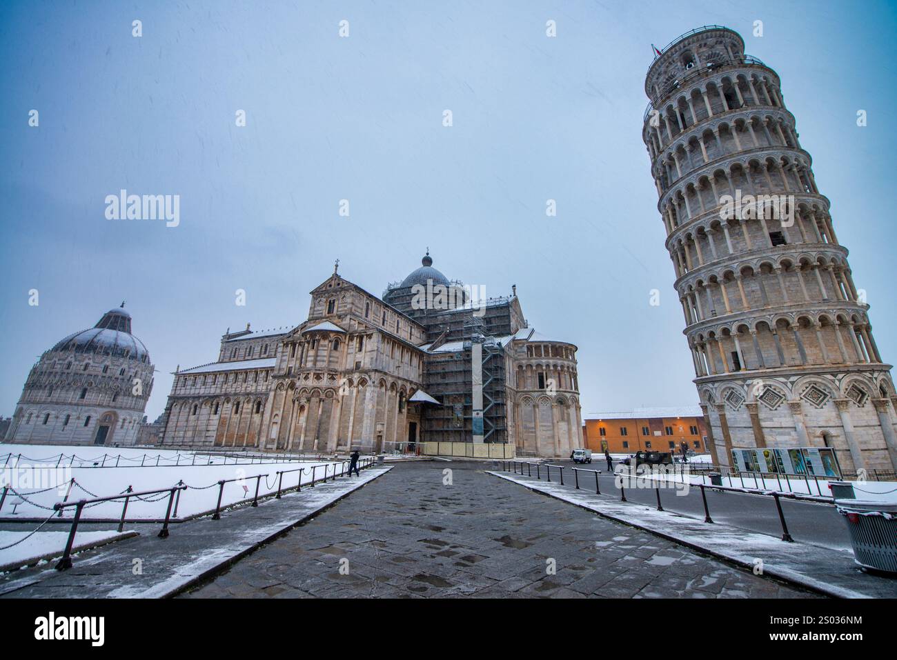 Snow-Capped Pisa: Capturing the Iconic Leaning Tower and City Streets ...