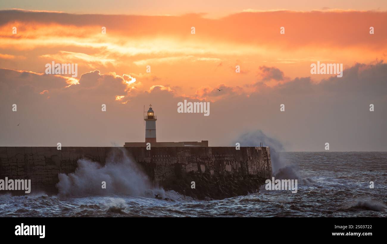 Strong December winds and tide at Newhaven lighthouse west beach on the ...