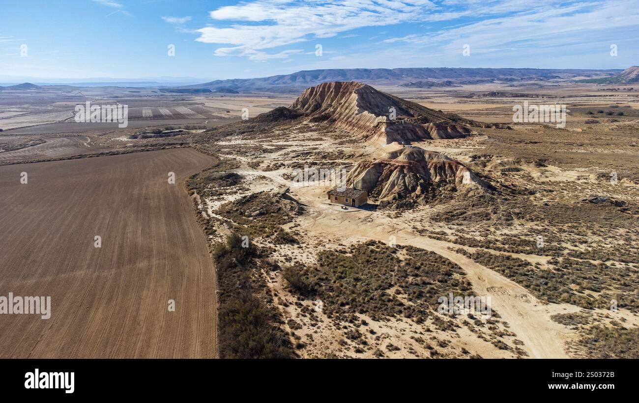 Aerial view of semi-desert badlands with brown hills of surprising ...