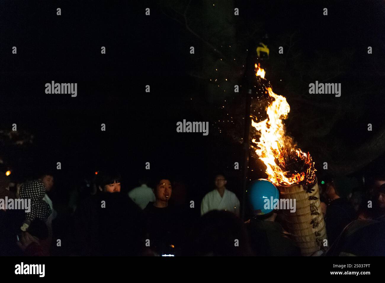 Miyajima, Japan - December 31, 2019. Participants of the Chinkasai Fire ...