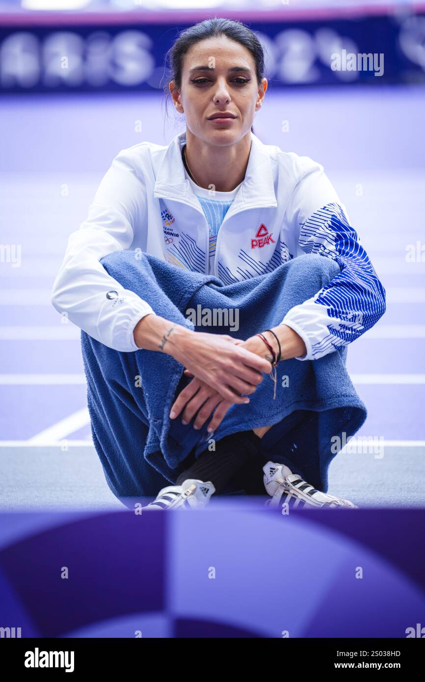 Daniela Stanciu participating in the high jump at the Paris 2024 ...