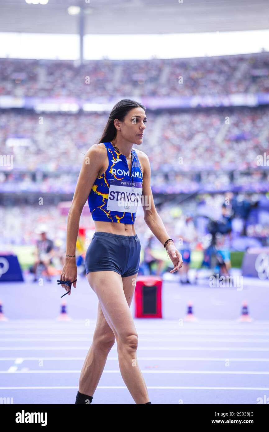Daniela Stanciu participating in the high jump at the Paris 2024 ...