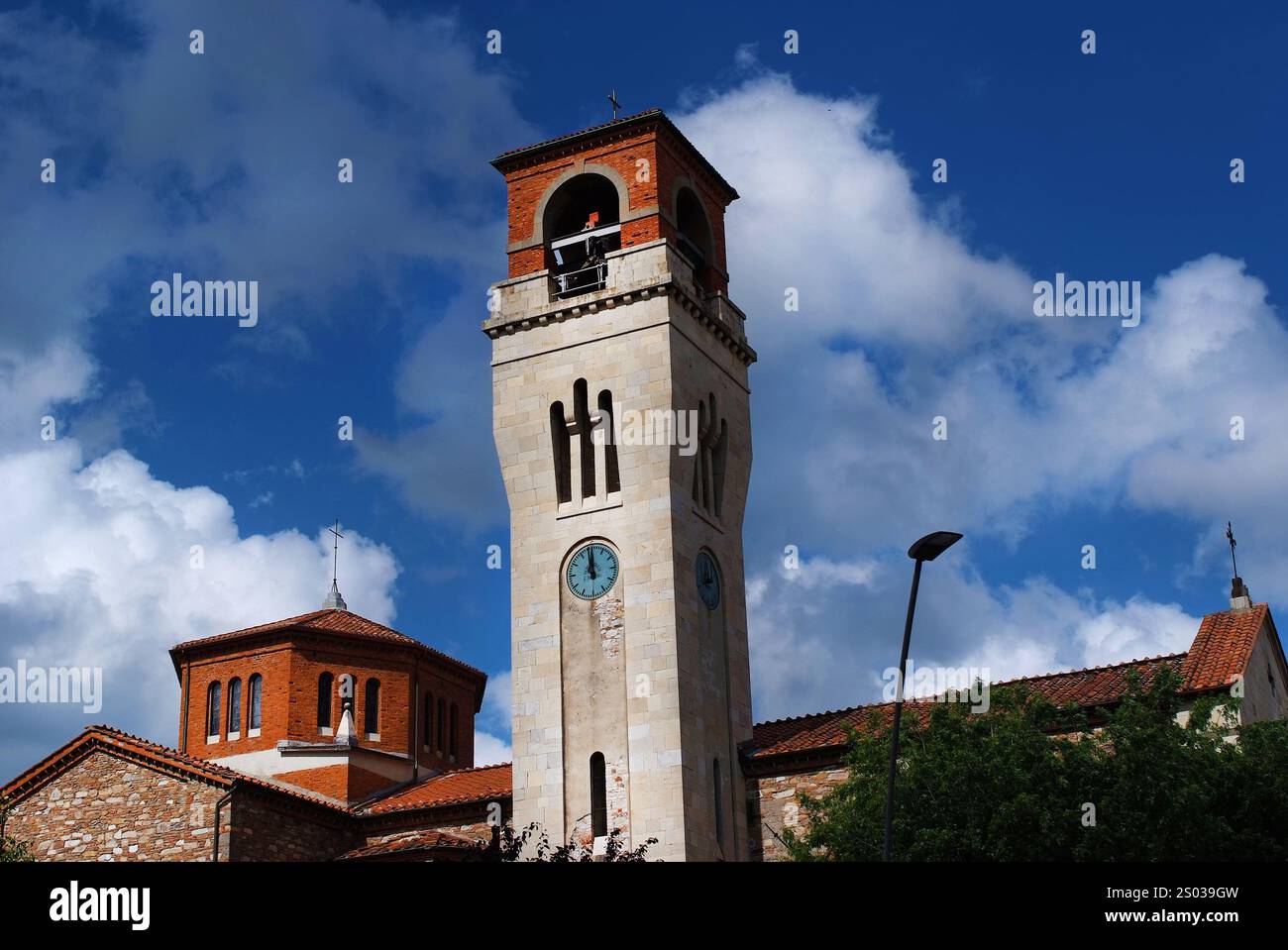 St Anna Church bell tower and dome among clouds in Lucca Stock Photo ...