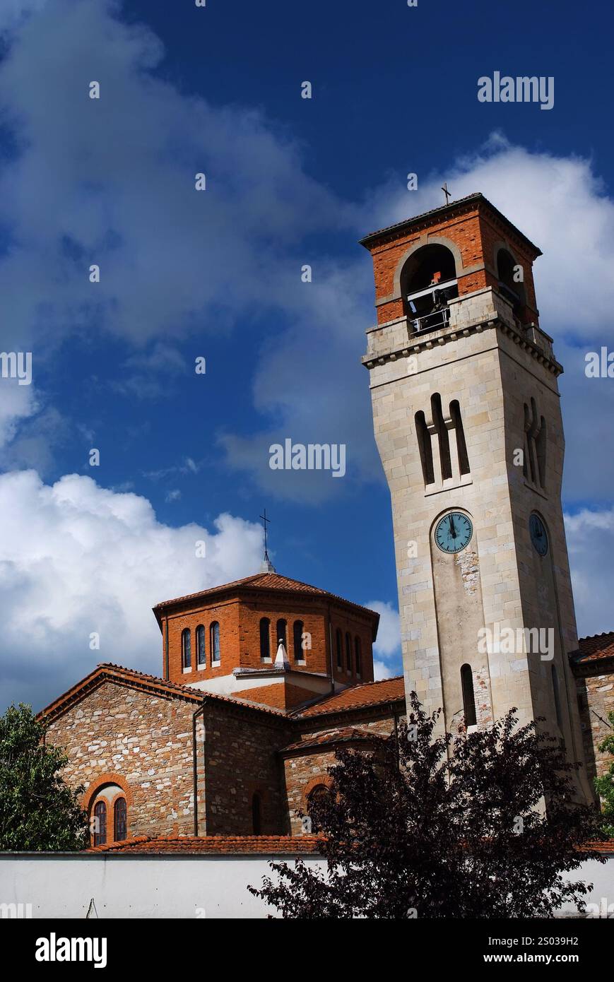 St Anna Church bell tower and dome among clouds in Lucca Stock Photo ...