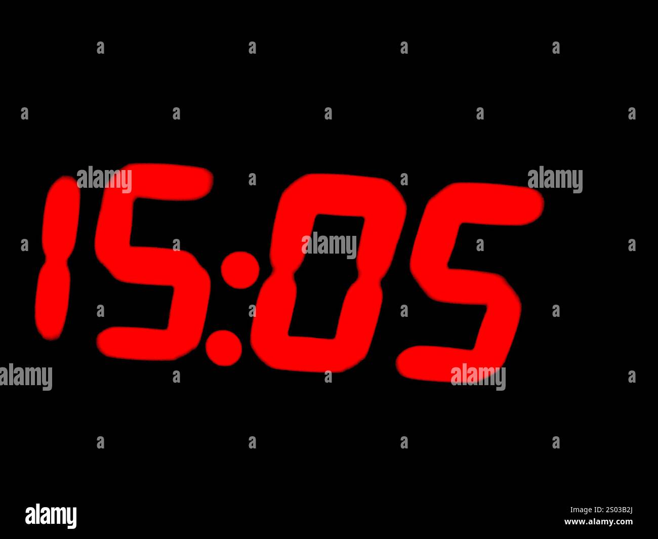 A digital clock face showing the time in red numbers on a black ...