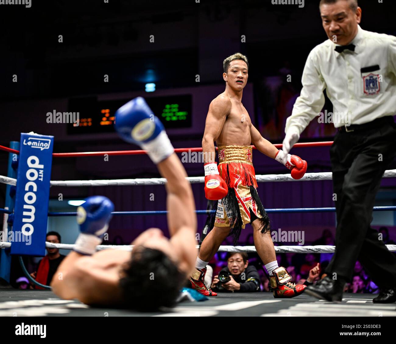 Tokyo, Japan. 12th Dec, 2024. Champion Kazuki Nakajima knocks down ...