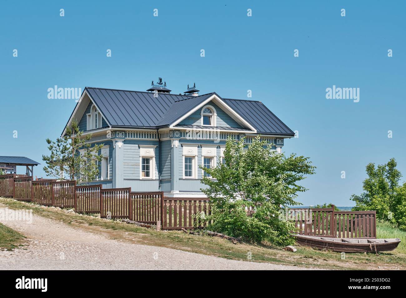 Classic one-story wooden residential private house with gray blue ...