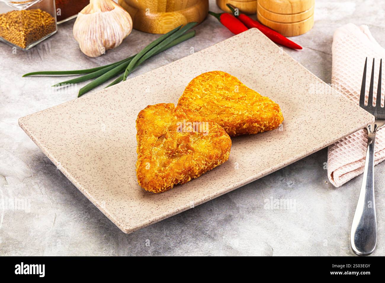 Fried potato hash brown snack for breakfast Stock Photo - Alamy