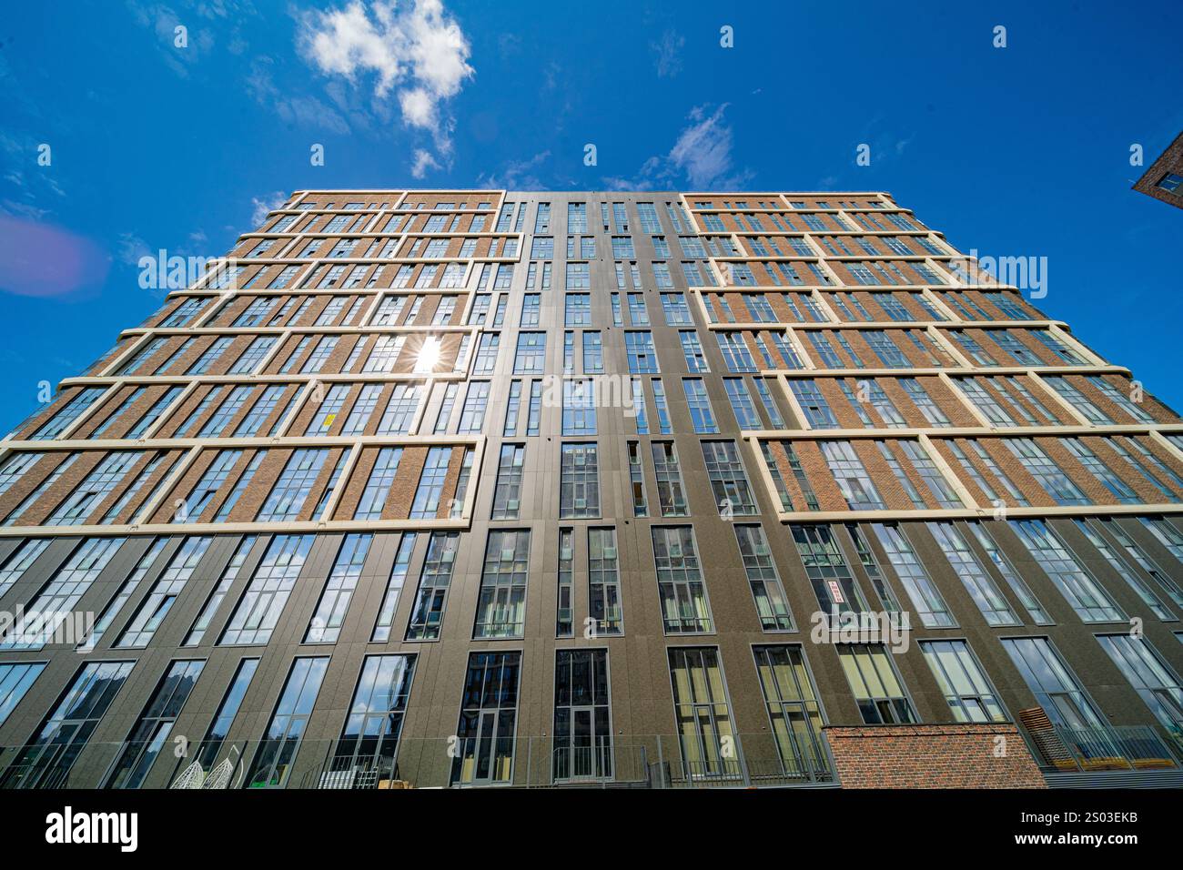 New building facade in housing complex. Modern style in architecture ...