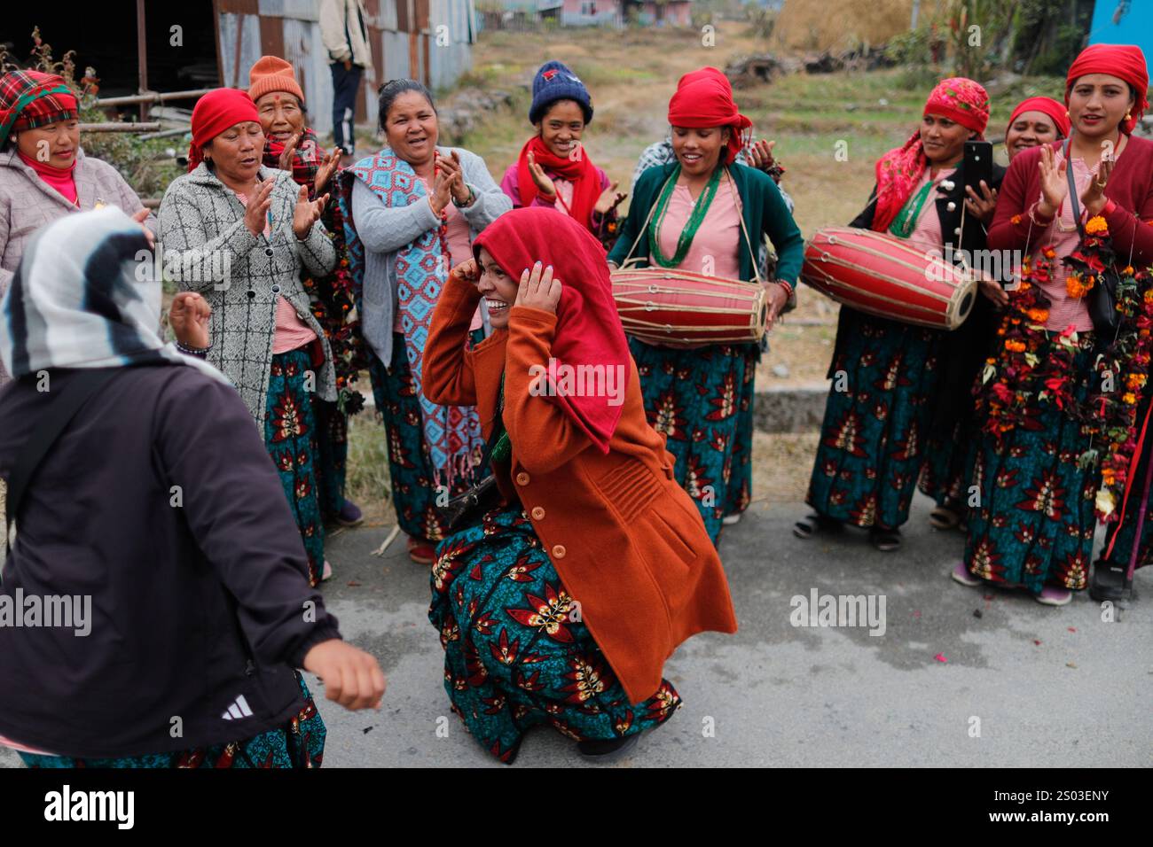 Pokhara, Nepal. 24th Dec, 2024. Women dressed in traditional attire ...