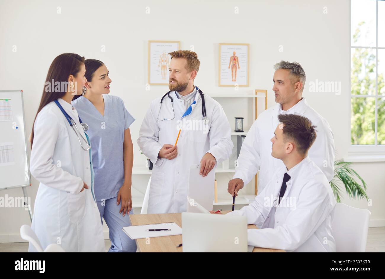 Medical Team Meeting In Hospital Office Stock Photo - Alamy