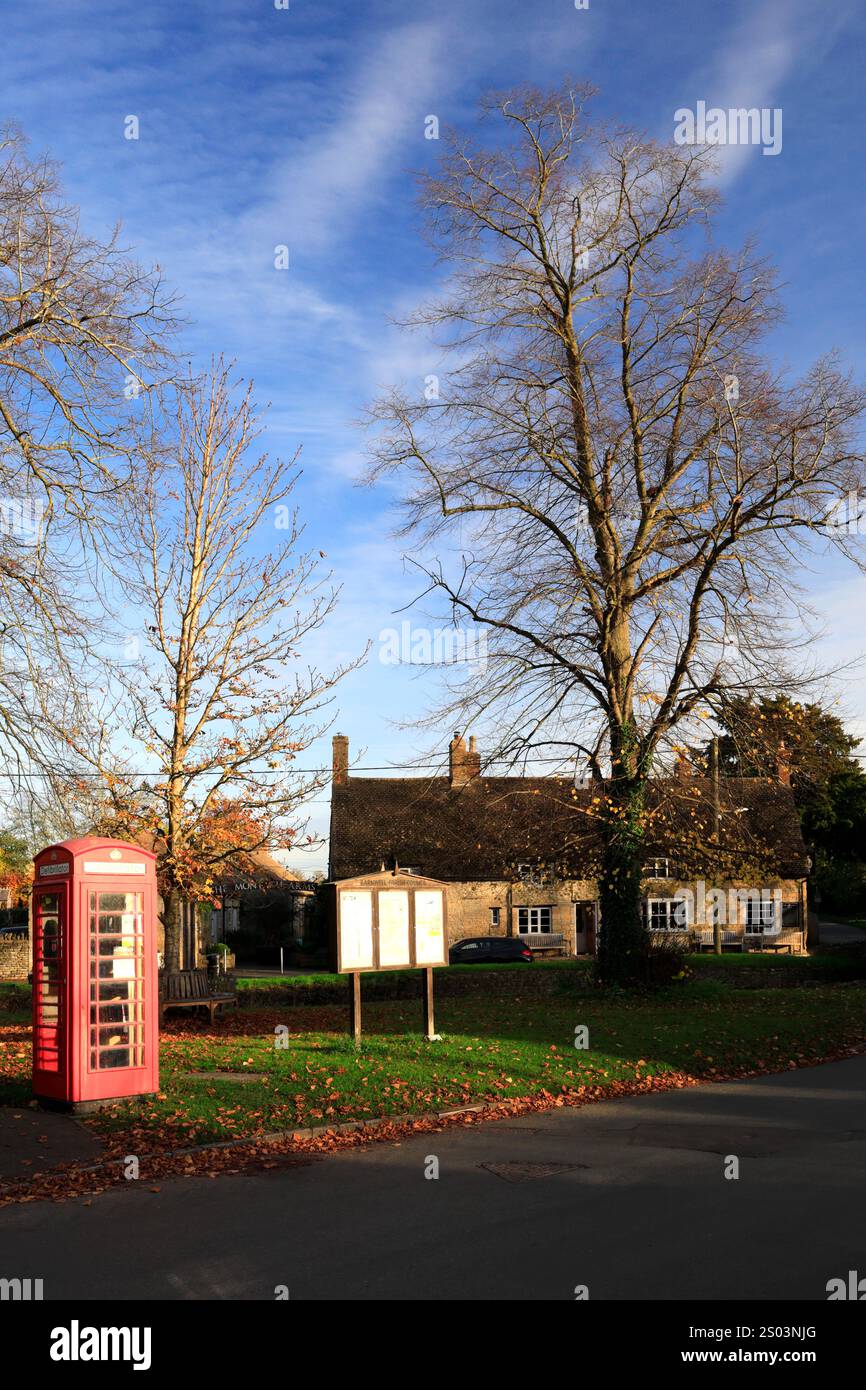 Autumn colours, The Montagu Arms pub, Barnwell village green ...
