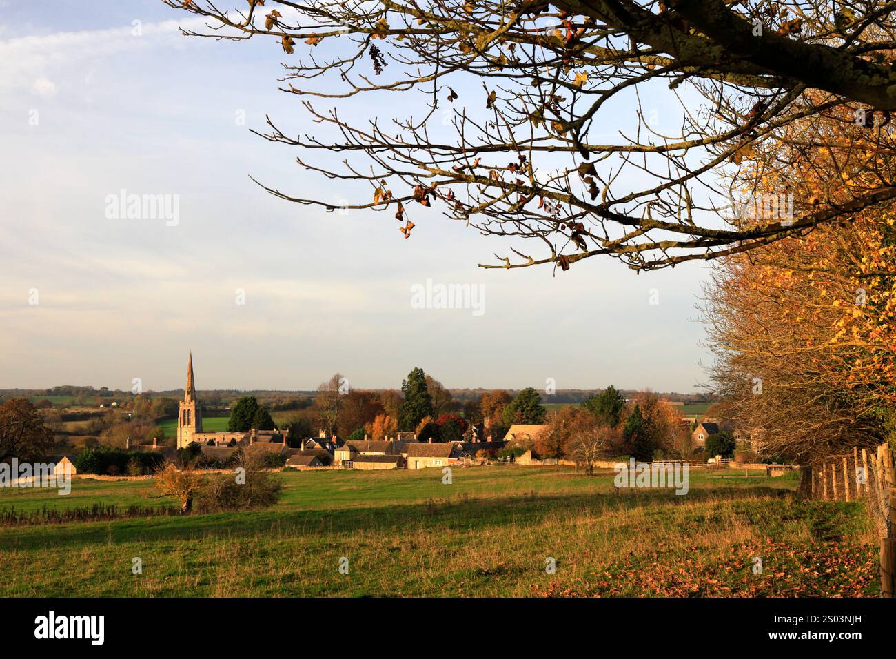 View to St Nicholas church, Bulwick village, Northamptonshire, England ...