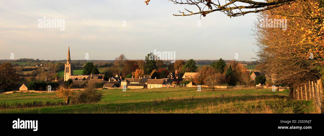 View to St Nicholas church, Bulwick village, Northamptonshire, England ...