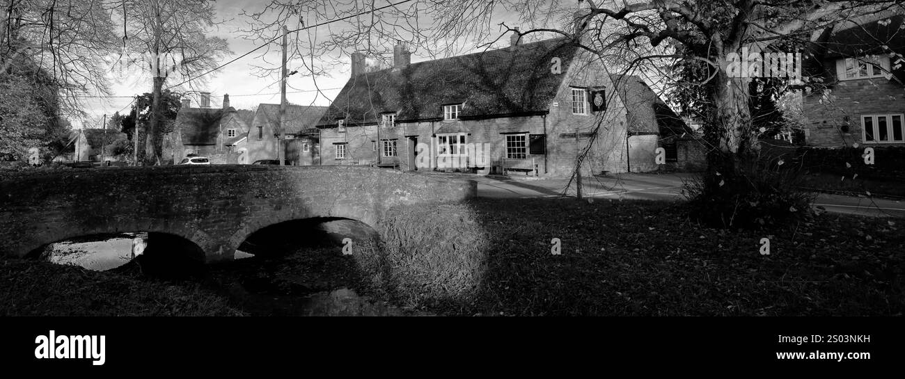 Autumn colours, The Montagu Arms pub, Barnwell village green ...