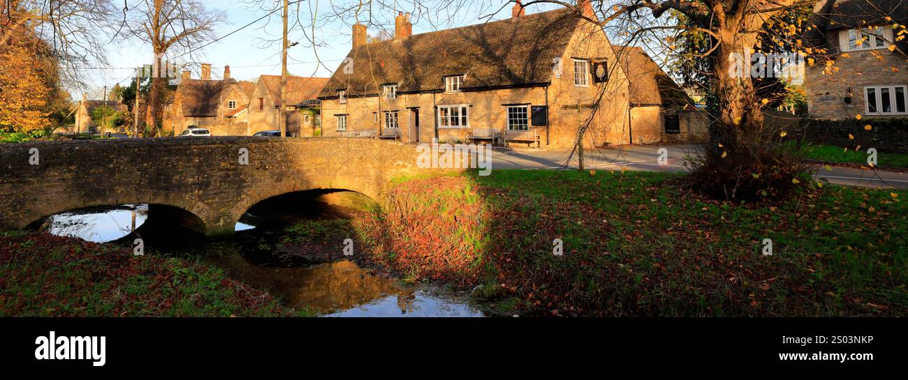 Autumn colours, The Montagu Arms pub, Barnwell village green ...