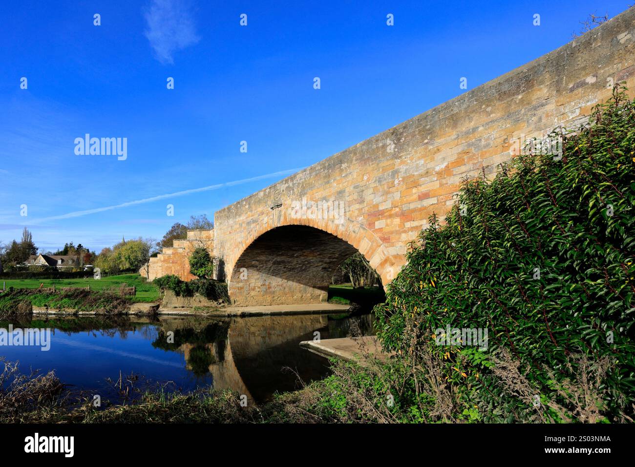 The Stone bridge over the river Nene, Wansford village, Cambridgeshire ...