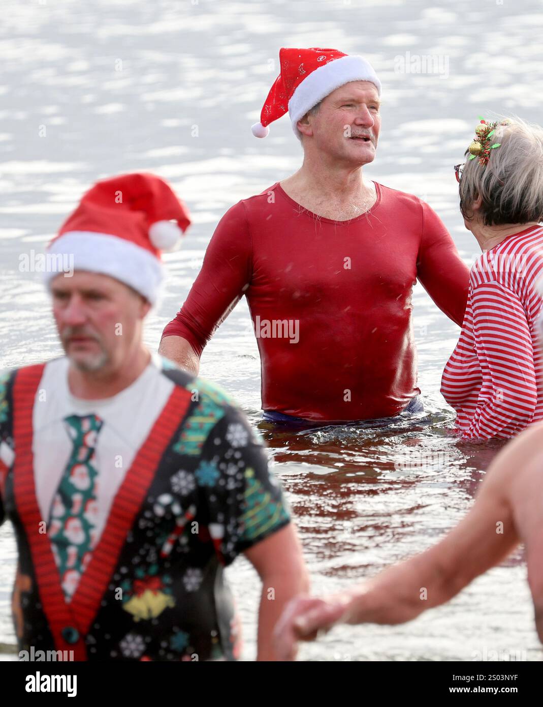 Senftenberg, Germany. 24th Dec, 2024. The ice bathers from the ...