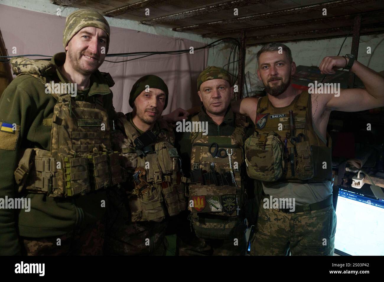 Ukrainian servicemen of 117th Separate Heavy Mechanized Brigade pose ...