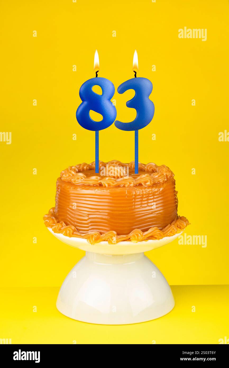 Happy birthday cake with number 83 candle - Card on a yellow background ...