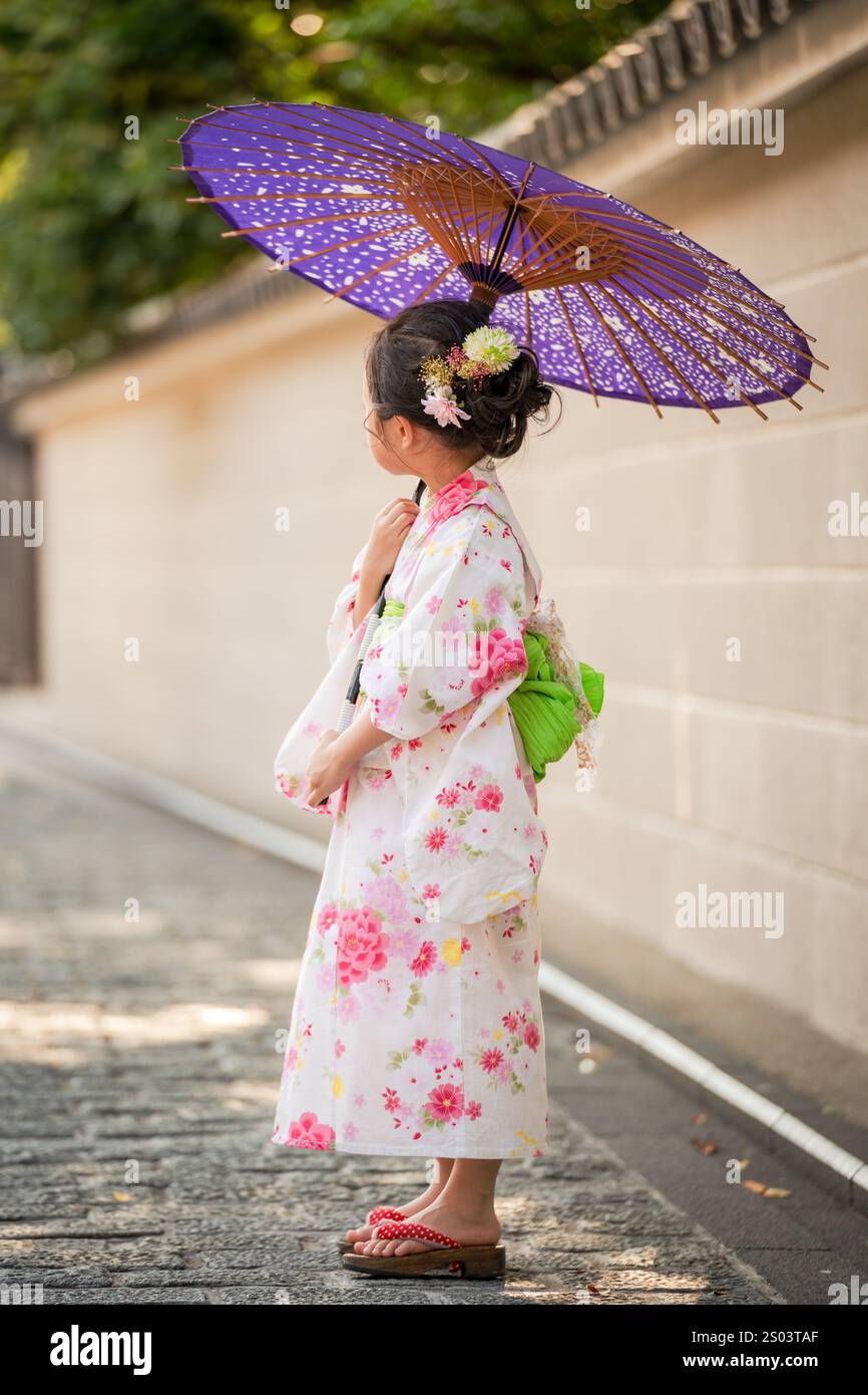 Girl wearing Yukata Kimono in Kyoto, Japan. Japanese traditional ...