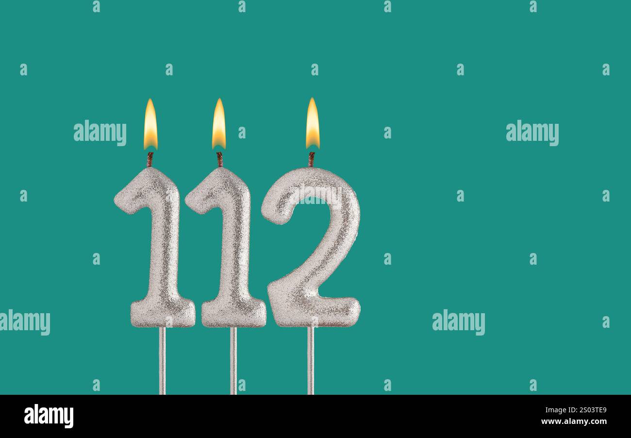 Birthday card on a green background - Candle in the shape of the number ...