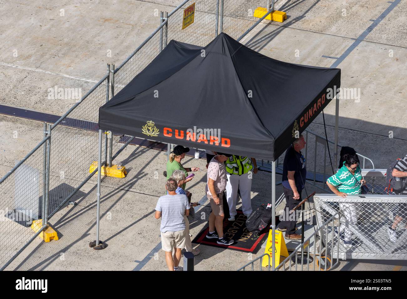 Passengers return to MS Queen Lizabeth cruise ship, passing by Cunard ...