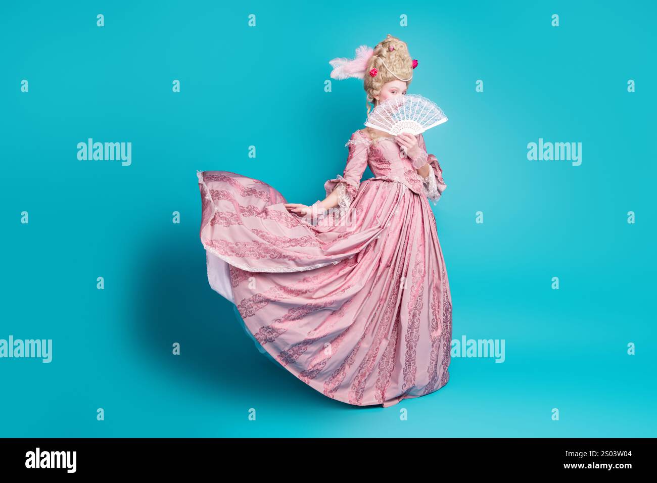 Photo of charming rococo duchess lady wear corset ball gown hold fan ...