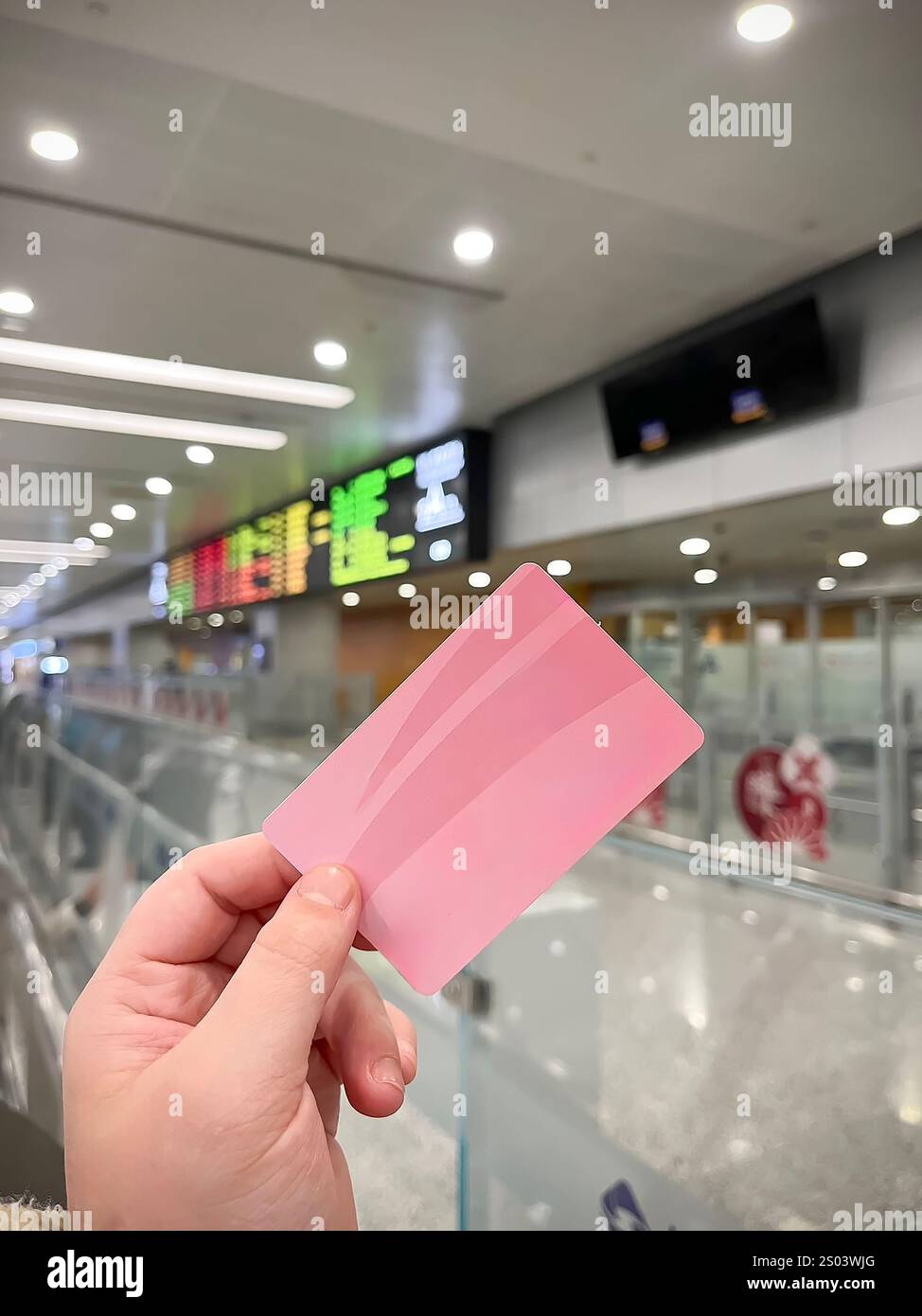 Passenger showing metro card in shanghai subway station, travel and ...