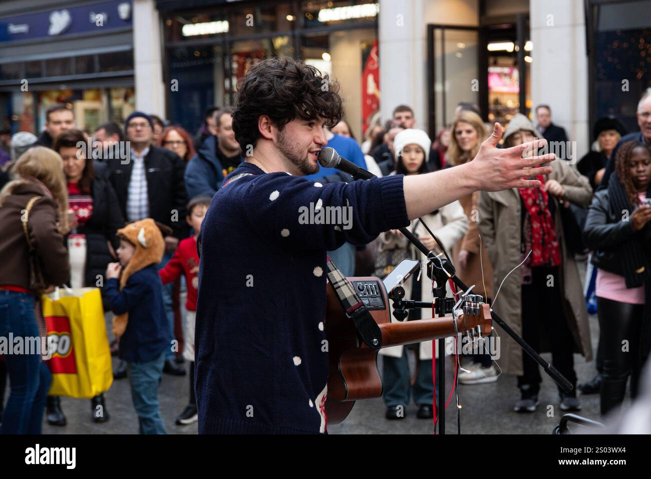 Grafton Street busker Sam Clifford draws in a crowd, as thousands flock ...