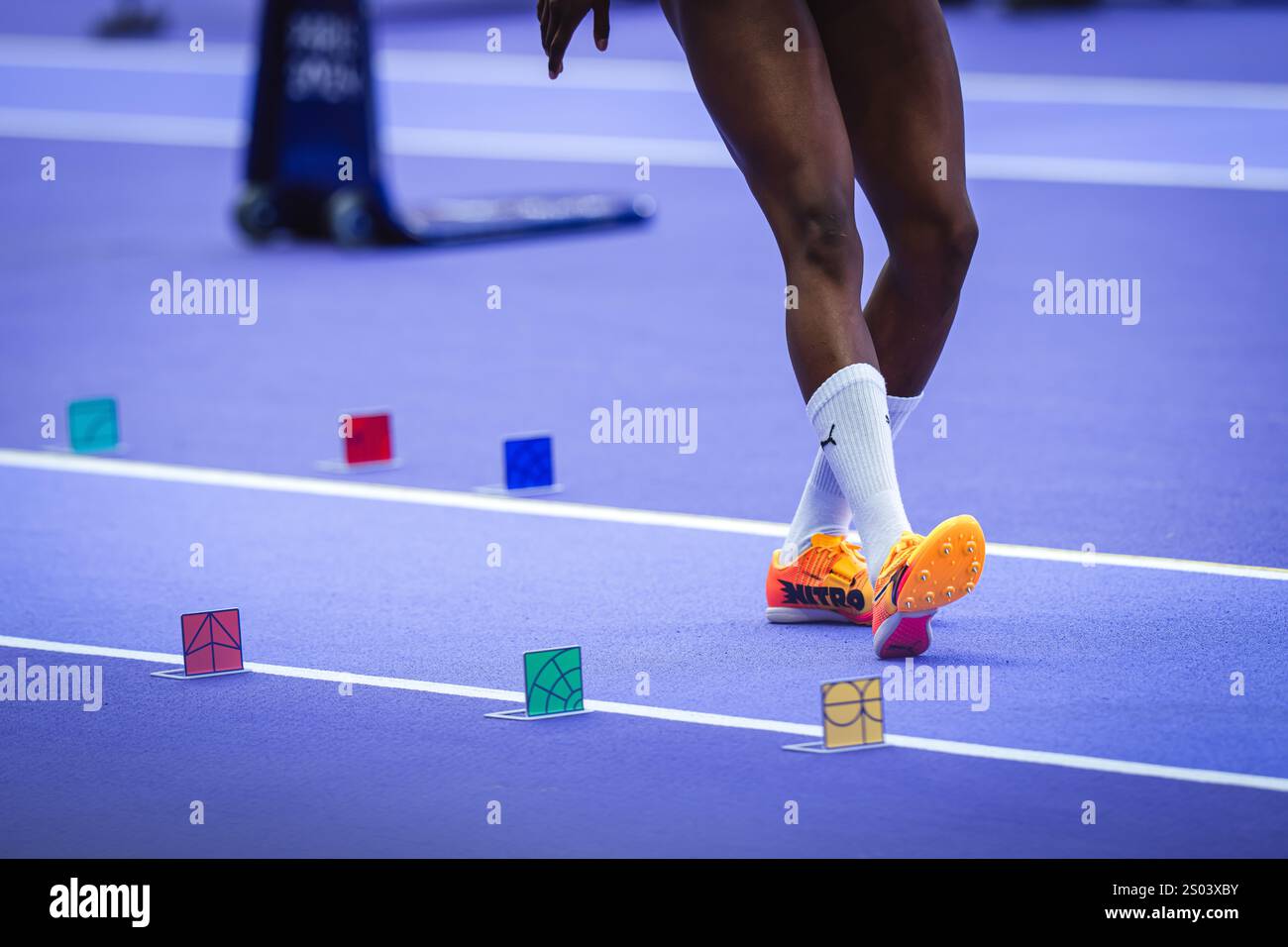 Mikaelle Assani participating in the long jump at the Paris 2024 ...