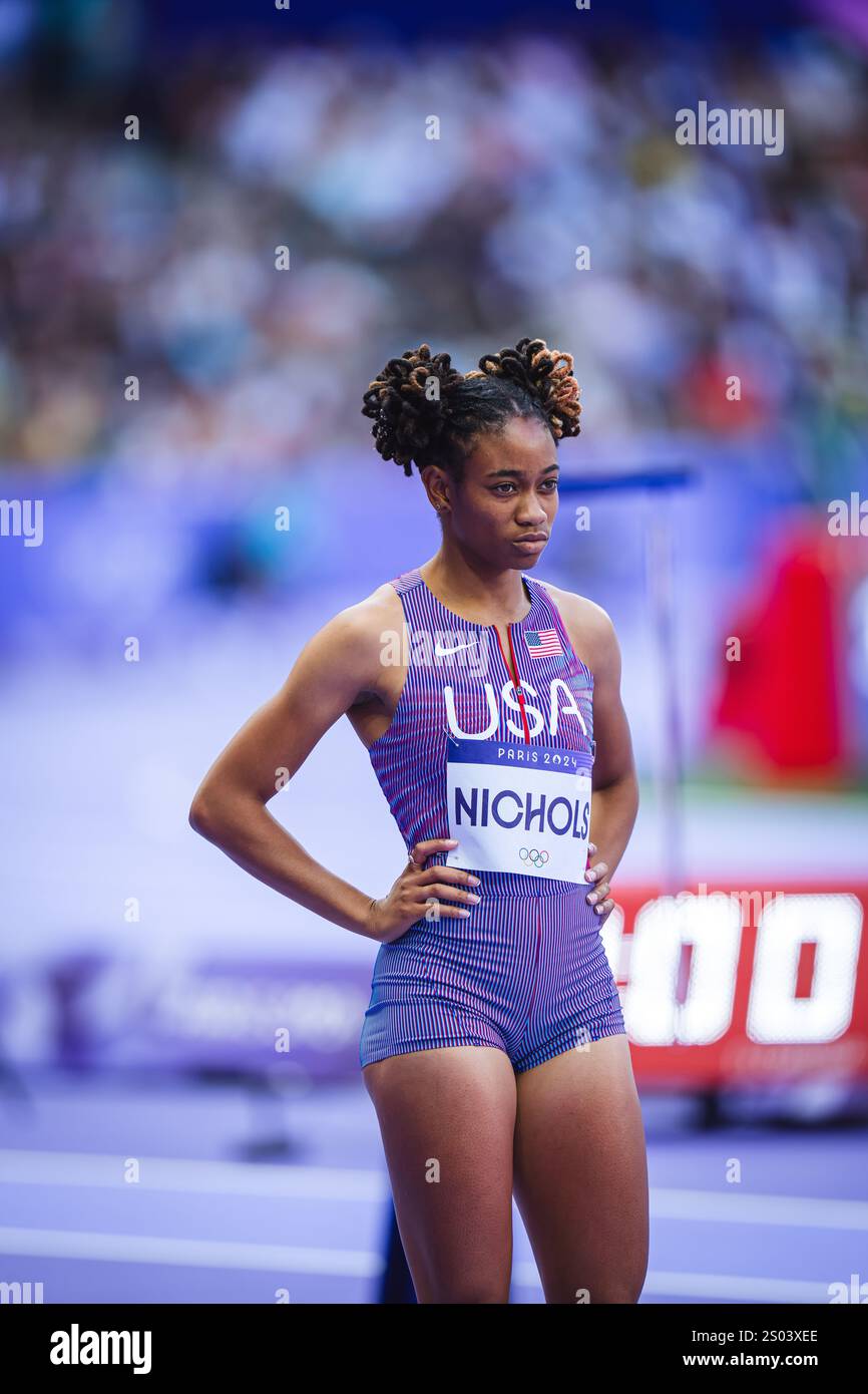 Monae' Nichols participating in the long jump at the Paris 2024 Olympic ...