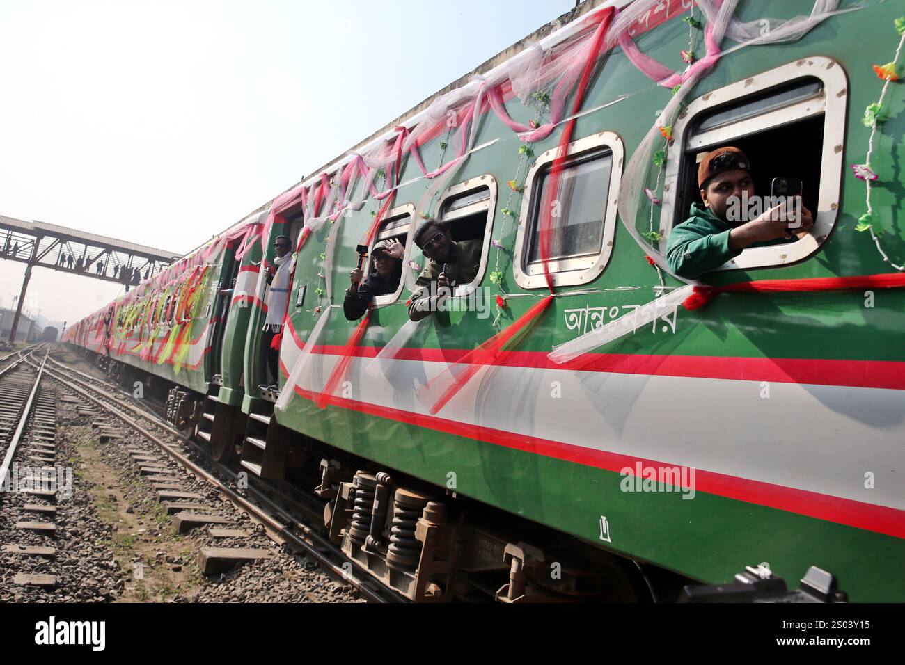 Dhaka, Bangladesh. 24th Dec 2024. People taking the first train of the ...