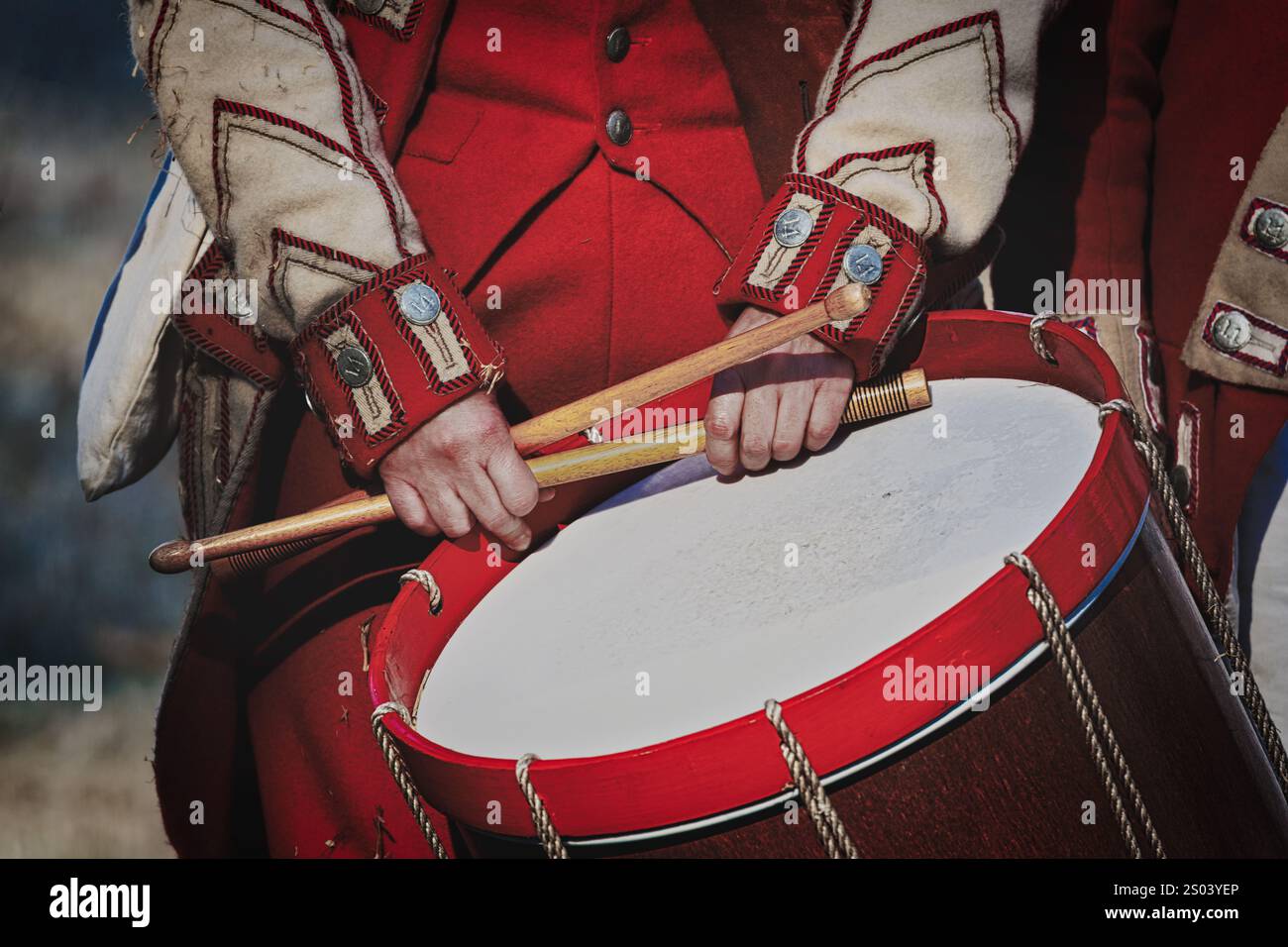 A field drummer hold thier drum sticks at a reenactment of the Battle ...