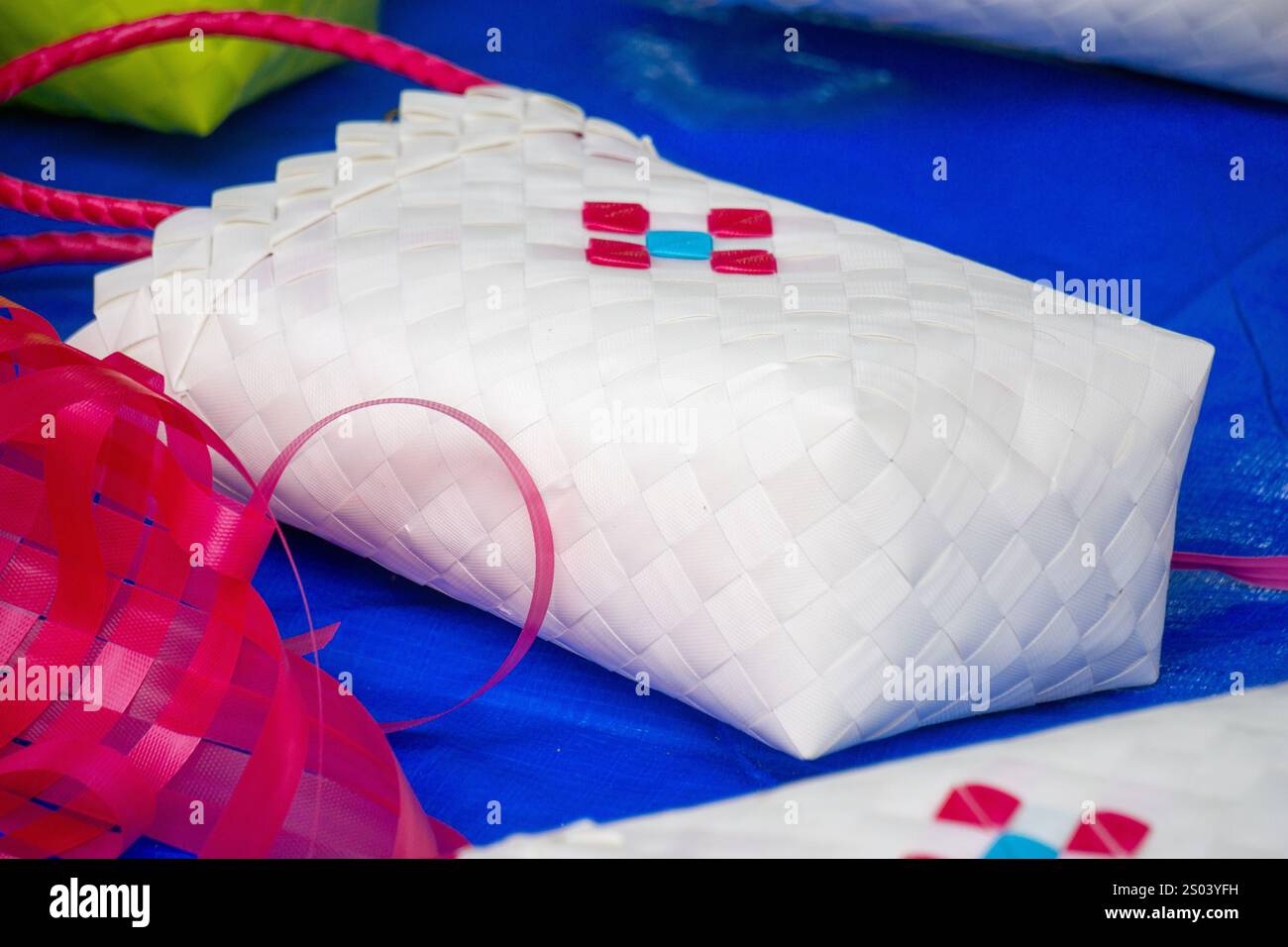 Create bags from woven plastic. Activities to reduce plastic waste ...