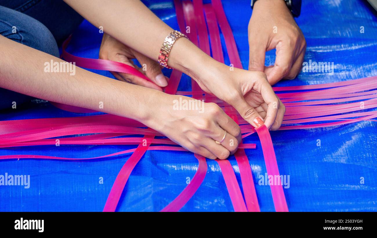 Create bags from woven plastic. Activities to reduce plastic waste ...