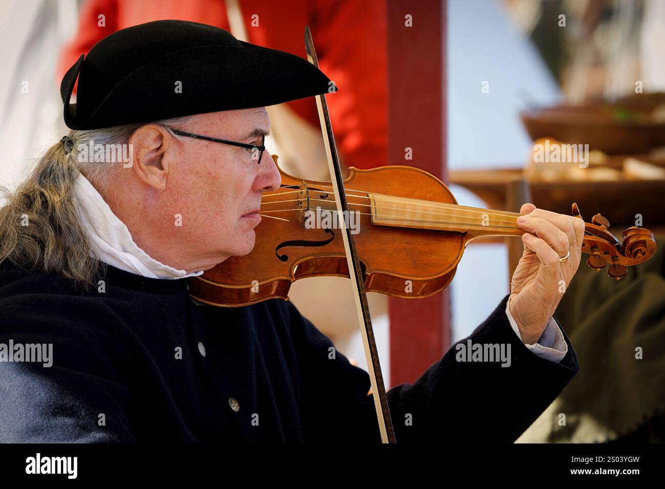 A violinist plays a song at a reenactment of the Battle of Great Bridge ...