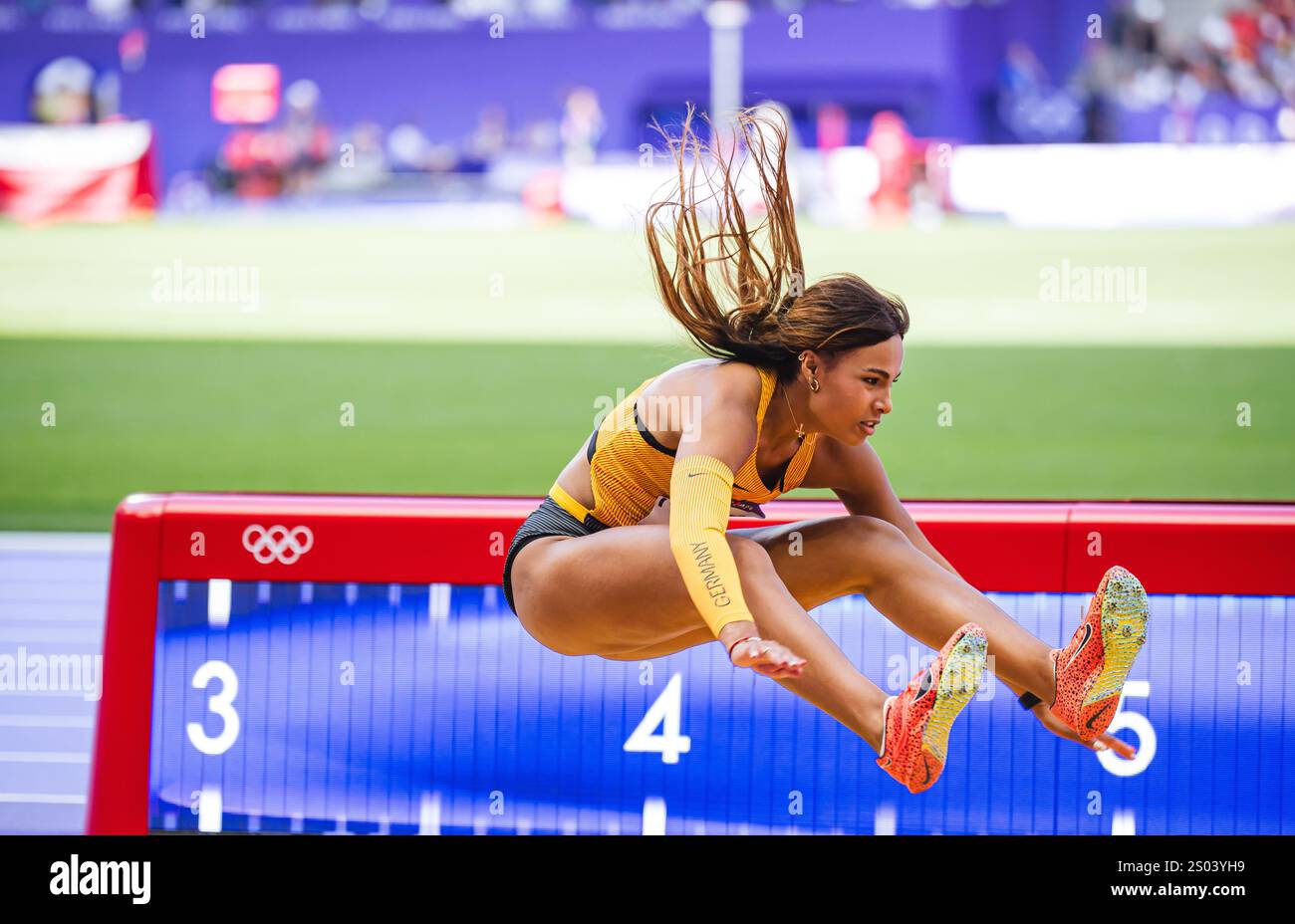 Mikaelle Assani participating in the long jump at the Paris 2024 ...