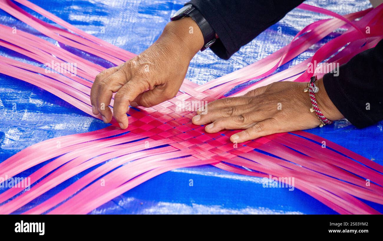 Create bags from woven plastic. Activities to reduce plastic waste ...