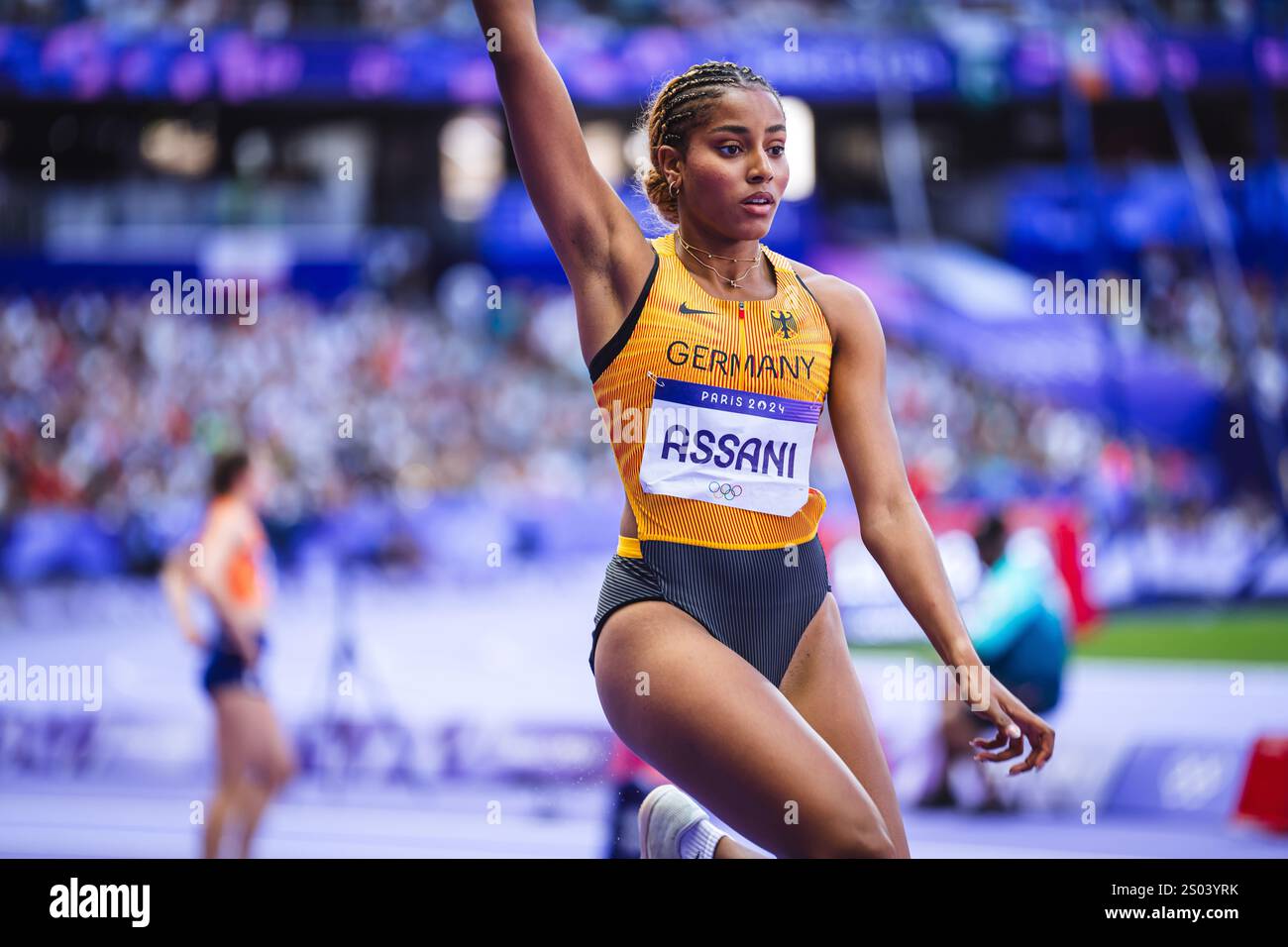 Mikaelle Assani participating in the long jump at the Paris 2024 ...
