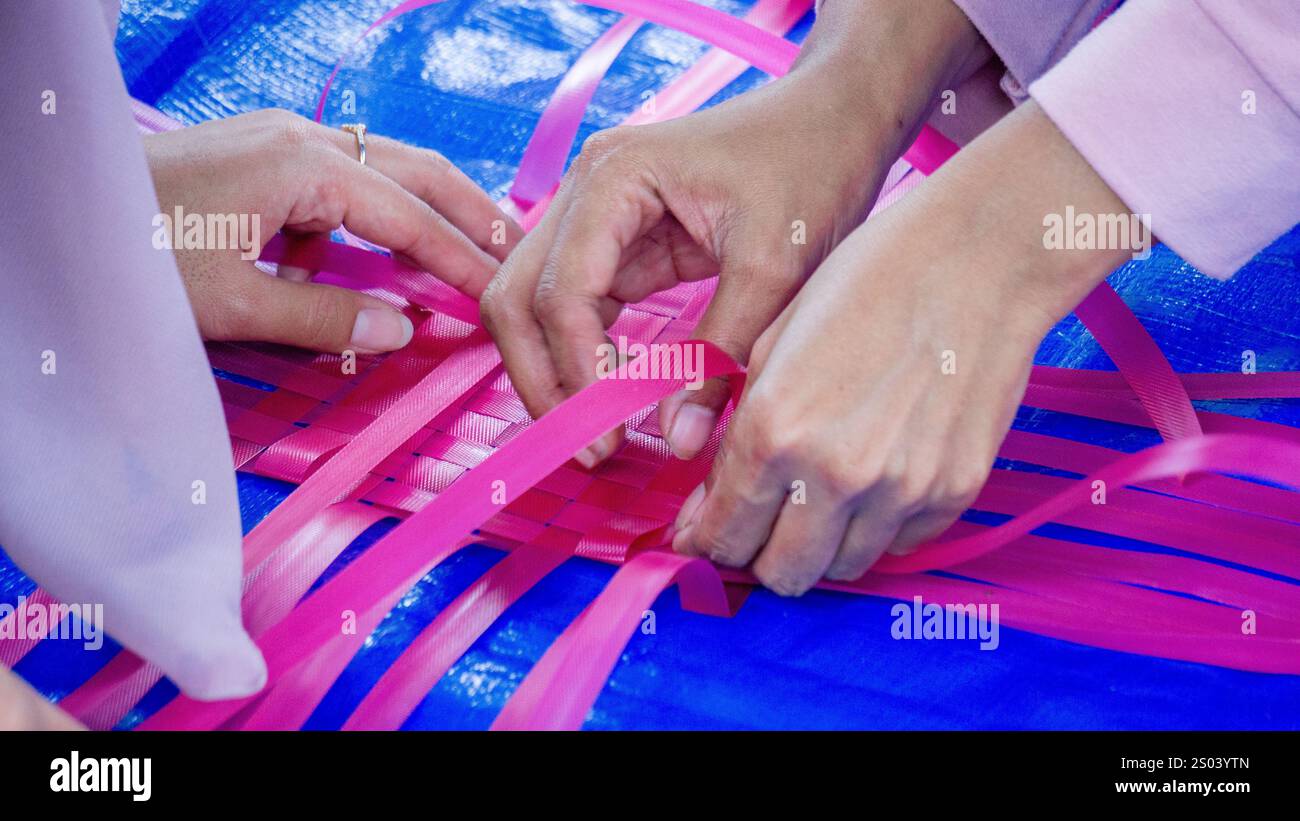 Create bags from woven plastic. Activities to reduce plastic waste ...