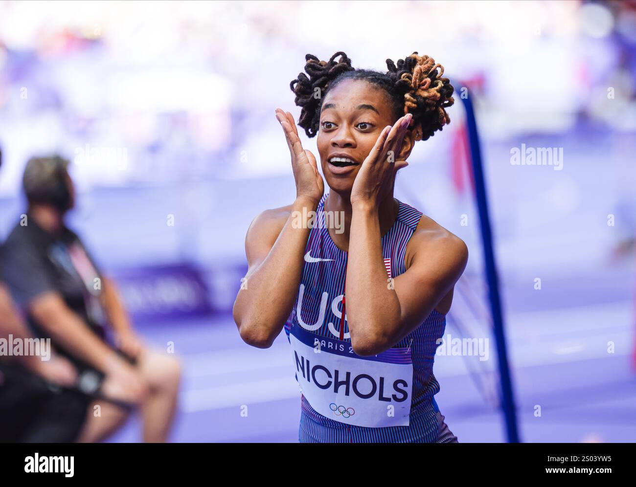Monae' Nichols participating in the long jump at the Paris 2024 Olympic ...