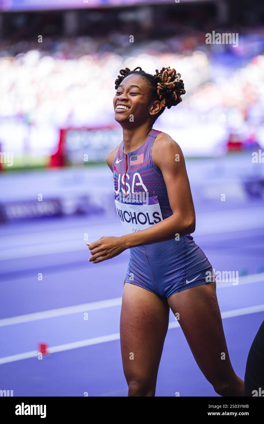 Monae' Nichols participating in the long jump at the Paris 2024 Olympic ...