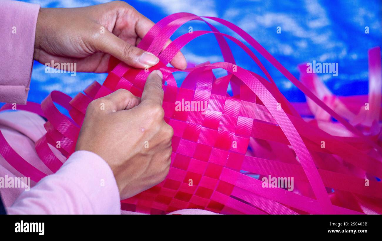 Create bags from woven plastic. Activities to reduce plastic waste ...