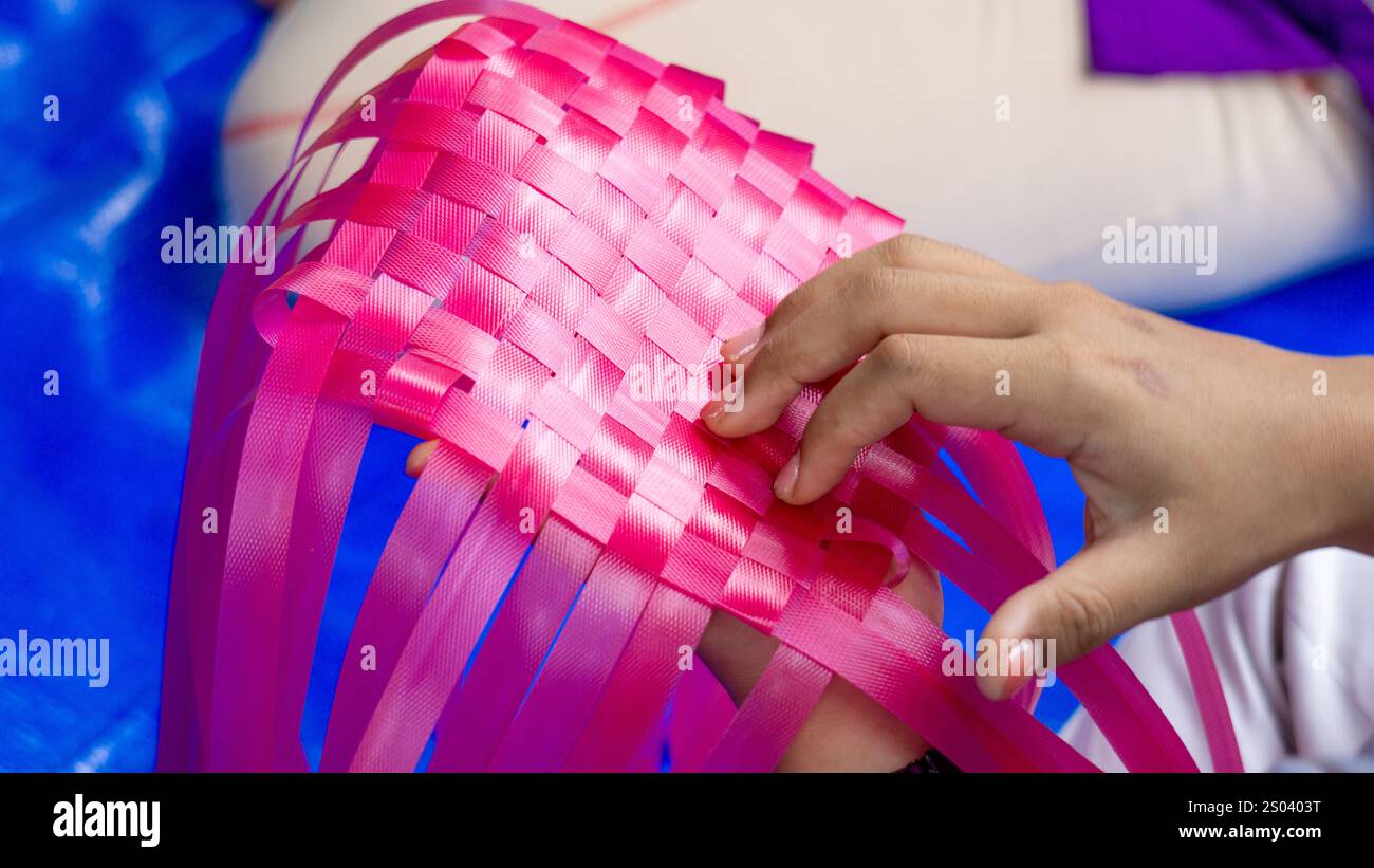 Create bags from woven plastic. Activities to reduce plastic waste ...